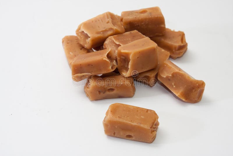 A Bunch of Caramel Candy on a White Background Stock Image - Image of ...