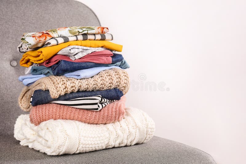 Bunch of Different Colorful Clothing Items Folded in Stack Stock Photo ...
