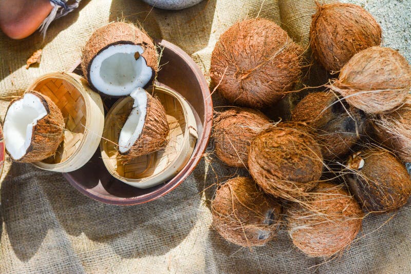 Bunch of Coconuts in the Bowl and on the Table Stock Image - Image of ...