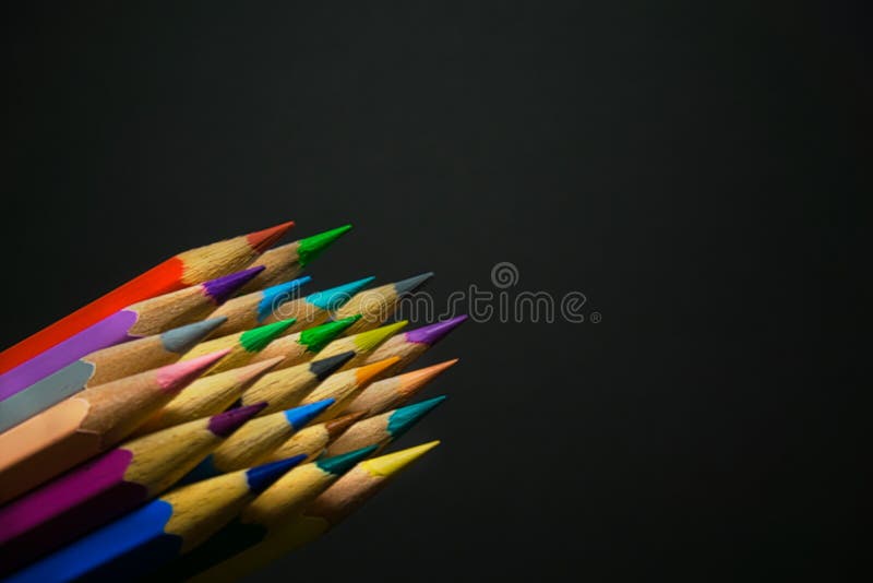 Group of Colored Pencils Bottom Left Corner on Black Background Copy ...