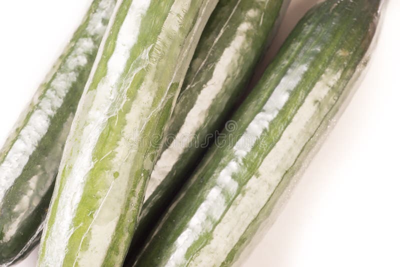 Bunch of Cucumber Wrapped in Plastic Films Stock Photo - Image of ...