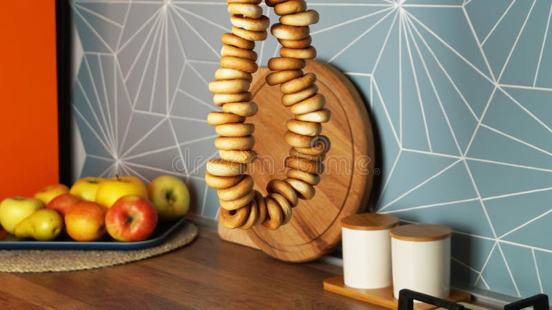 Bunch of Delicious Ring Shaped Sushki Dry Bagels Hanging in Kitchen ...
