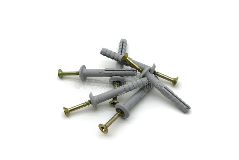 A Bunch of Dowel Nails and Plastic Plugs for Them. Stock Photo - Image ...