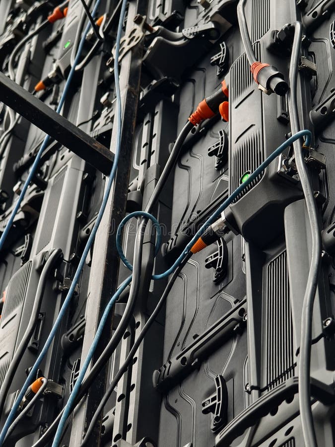 A Bunch of Electrical Wires and Connectors are Hanging Down from a Led ...