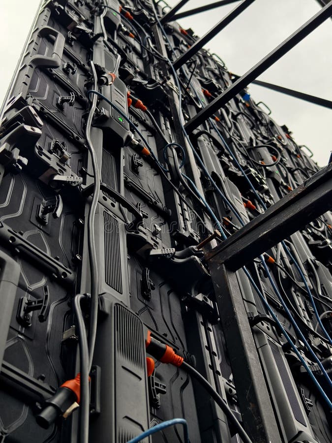 A Bunch of Electrical Wires and Connectors are Hanging Down from a Led ...