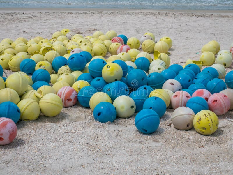 Floating Buoy on a Beach. Floating Buoy Ball for Safety Stock Photo ...