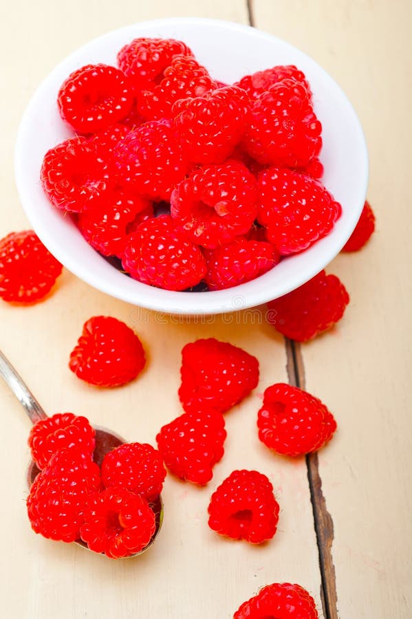 Bunch of Fresh Raspberry on a Bowl and White Table Stock Image - Image ...