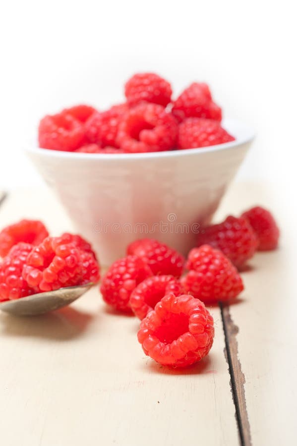 Bunch of Fresh Raspberry on a Bowl and White Table Stock Image - Image ...