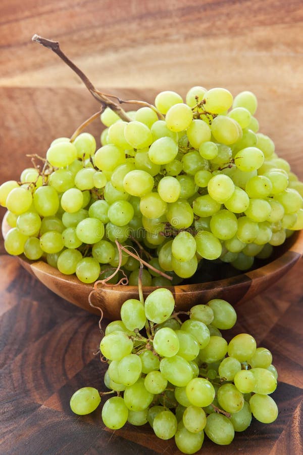 Bunch of Green Grapes in Bowl on Wooden Table Stock Image - Image of ...