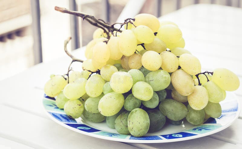 Bunch of Green Grapes on White Plastic Table Stock Image - Image of ...
