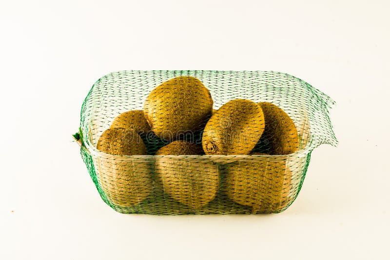 A Bunch of Green Kiwi Fruit in a Plastic Container Stock Image - Image ...