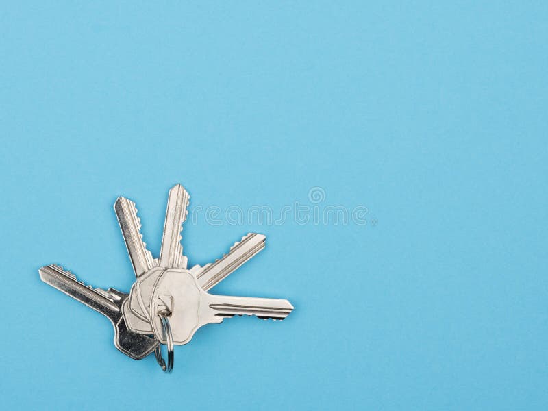 A Bunch of Keys on a Blue Background Stock Image - Image of classic ...