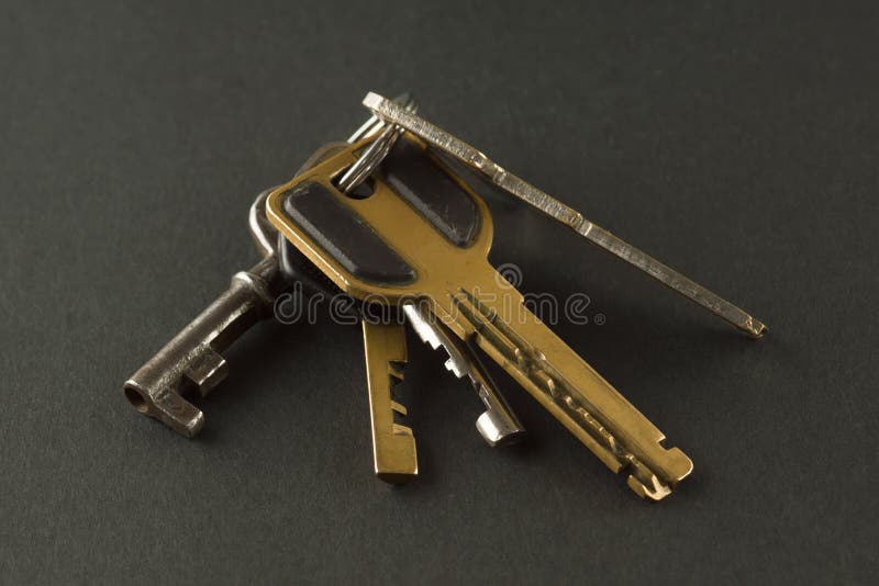 Bunch of Keys To the Apartment on a Black Background Stock Photo ...