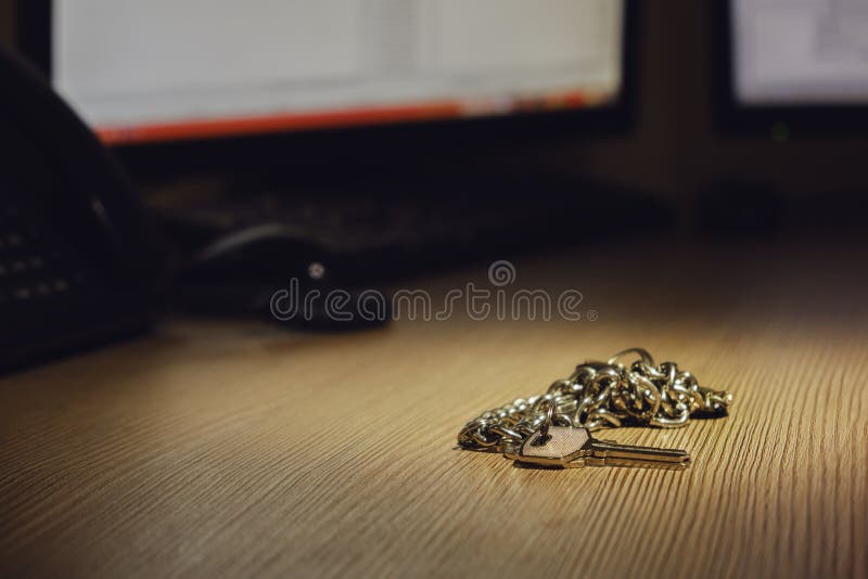 A Bunch of Keys To the Room Lies on an Office Desk with Computer Moni ...