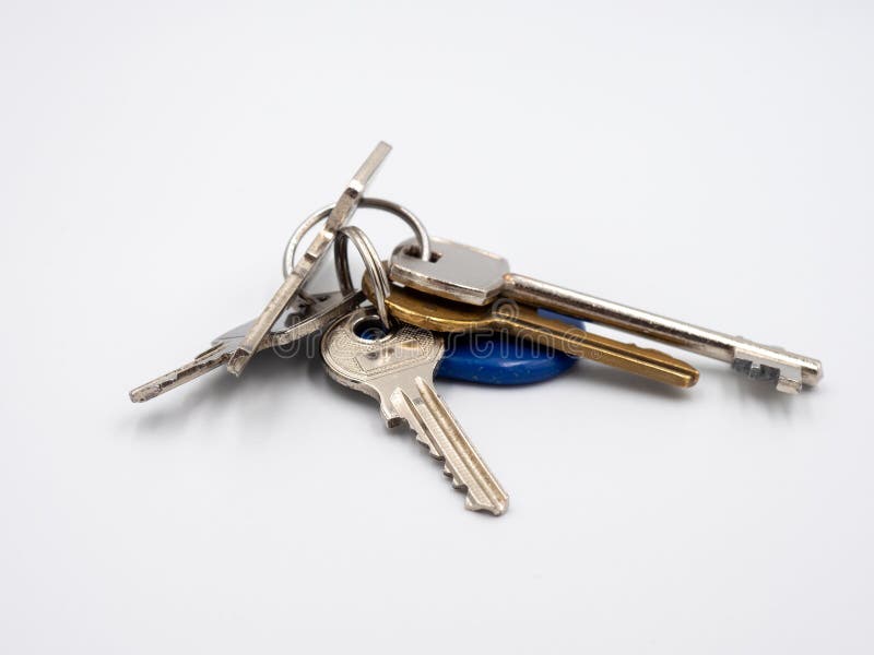 A Bunch of Keys on a White Background Stock Photo - Image of silver ...