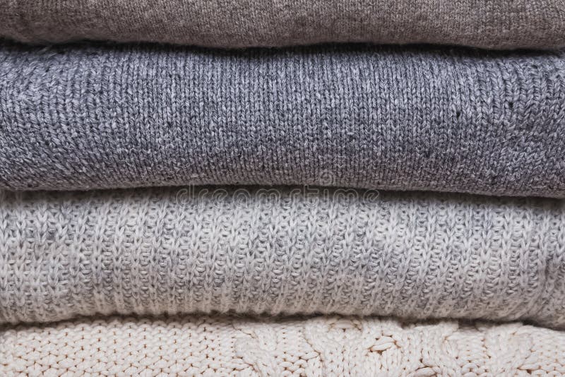 Bunch of Knitted Warm Sweaters, Different Knitting Patterns Folded in ...