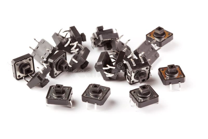 A Bunch of Little Electronic Buttons on a White Background Stock Photo ...