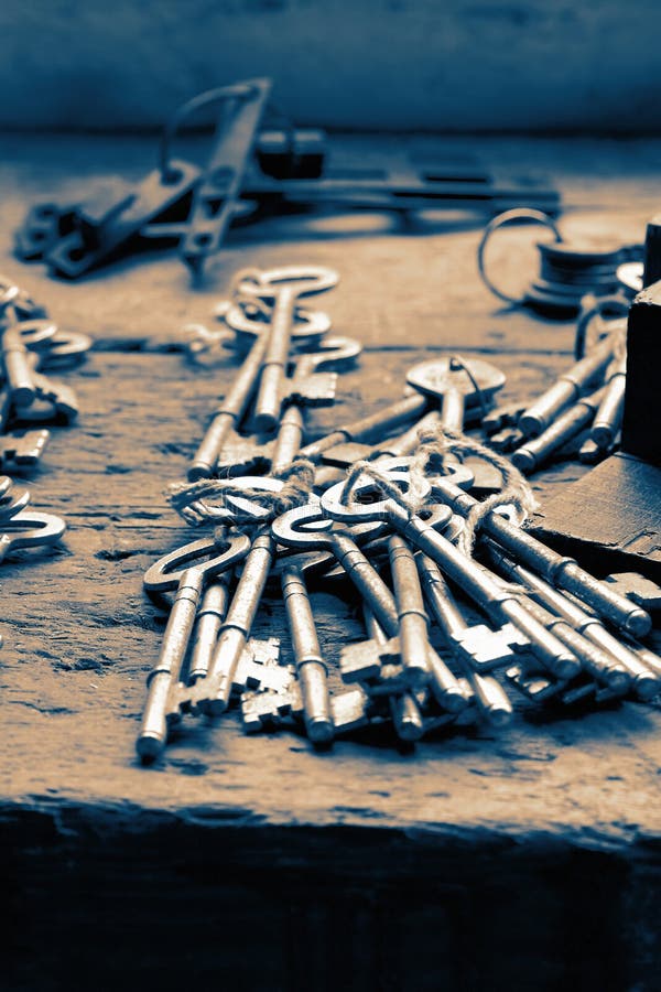 Old keys on workbench A stock image. Image of wooden - 33777551