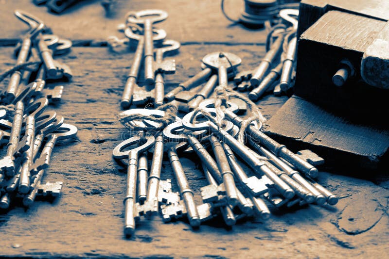 Old keys on workbench a stock image. Image of wooden - 33777551