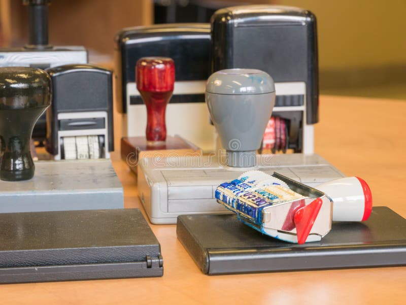 Bunch of Old Office Stamp on a Desk Stock Photo - Image of officially ...