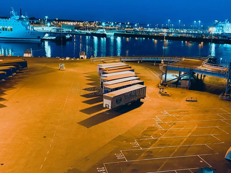 Bunch of Parked Lorry or Truck Trailers in Front of a Ferry Boat in the ...
