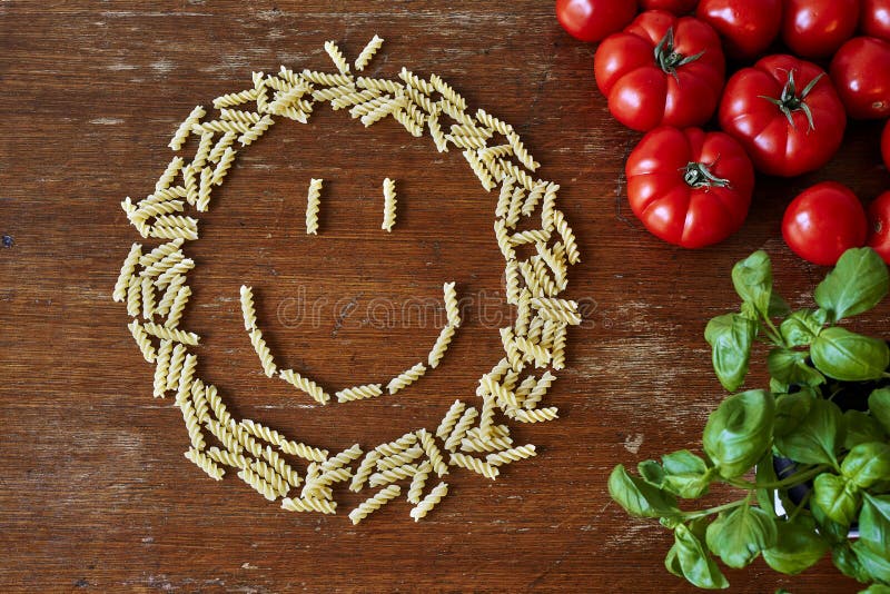 A Bunch of Pasta in Form of a Smiley Face Stock Photo - Image of pasta ...