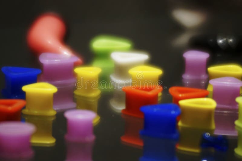 Bunch of Plastic Expander Rings Stock Image - Image of tattoo, rings ...
