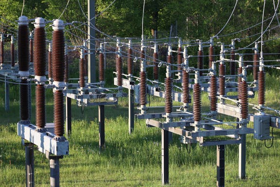 A Bunch of Power Lines are in a Field Stock Photo - Image of disconnect ...