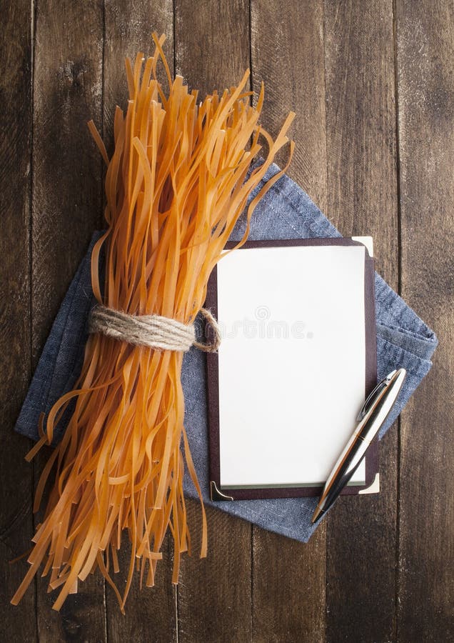Bunch of Raw Tagliatelle Pasta with Notebook Paper Stock Image - Image ...