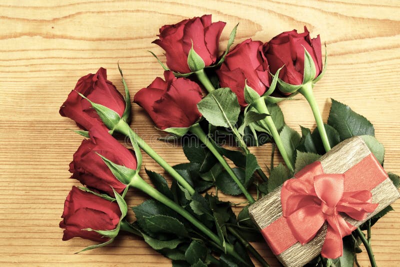 Bunch of Red Roses and Gift Box with Red Ribbon Stock Photo - Image of ...