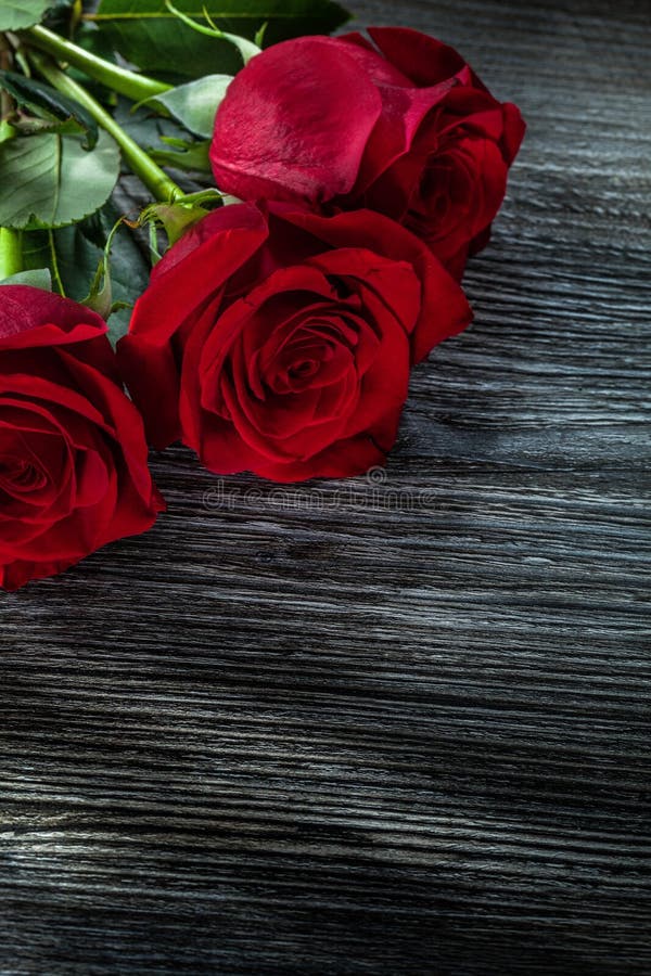 Bunch of Red Roses on Wooden Board Top View Stock Photo - Image of ...