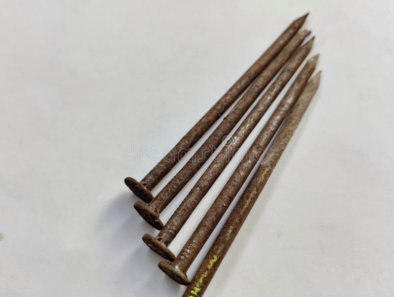 A Bunch of Rusty Concrete Nails Stock Photo - Image of sharp, material ...