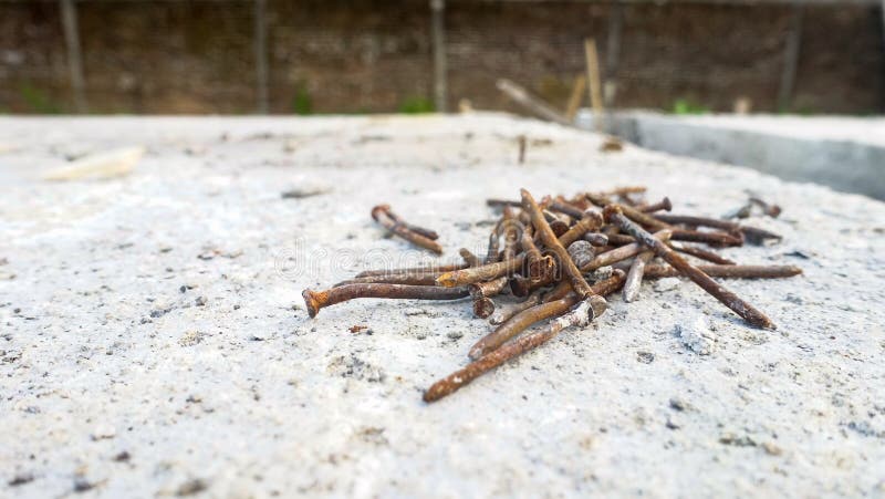 A Bunch of Rusty Nails on the Floor Stock Image - Image of sand, pest ...