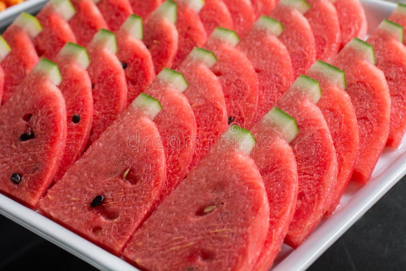 Bunch of Sliced Watermelons Stock Photo - Image of watermelon ...