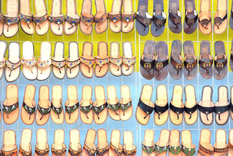 Bunch of Slippers Presented on a Metallic Stand Stock Photo - Image of ...