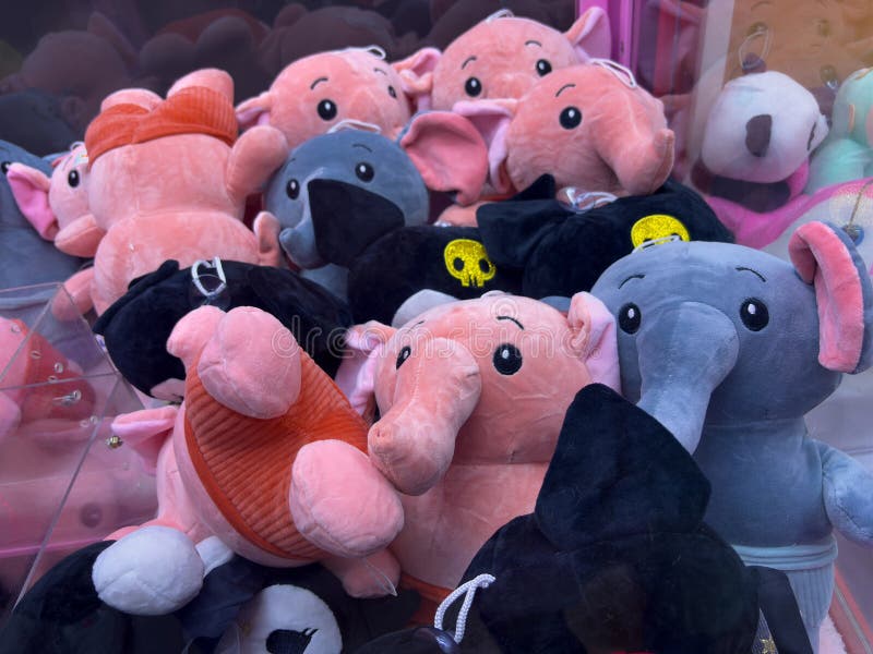 A Bunch of Stuffed Animals, Including Elephants, Pigs, and Elephants ...