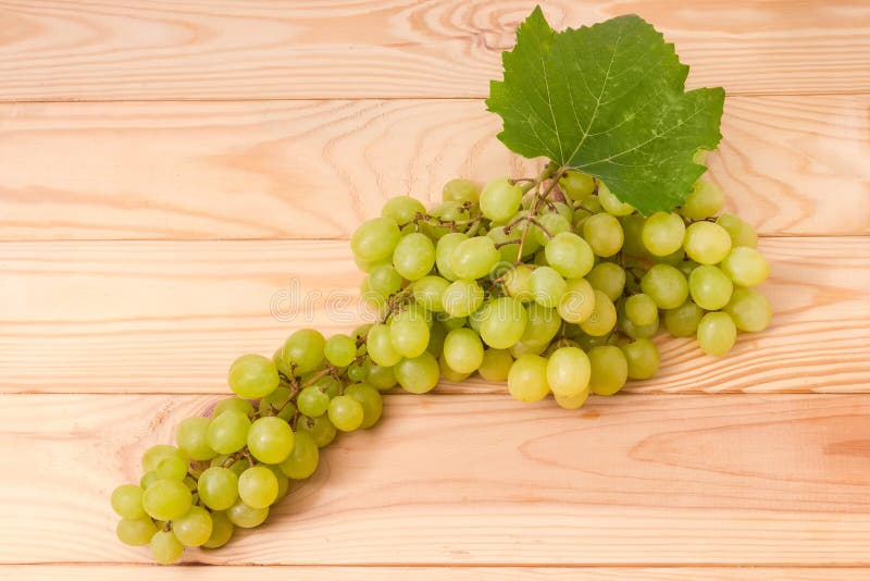 Bunch of the Sultana Grape with Vine on Rustic Table Stock Photo ...