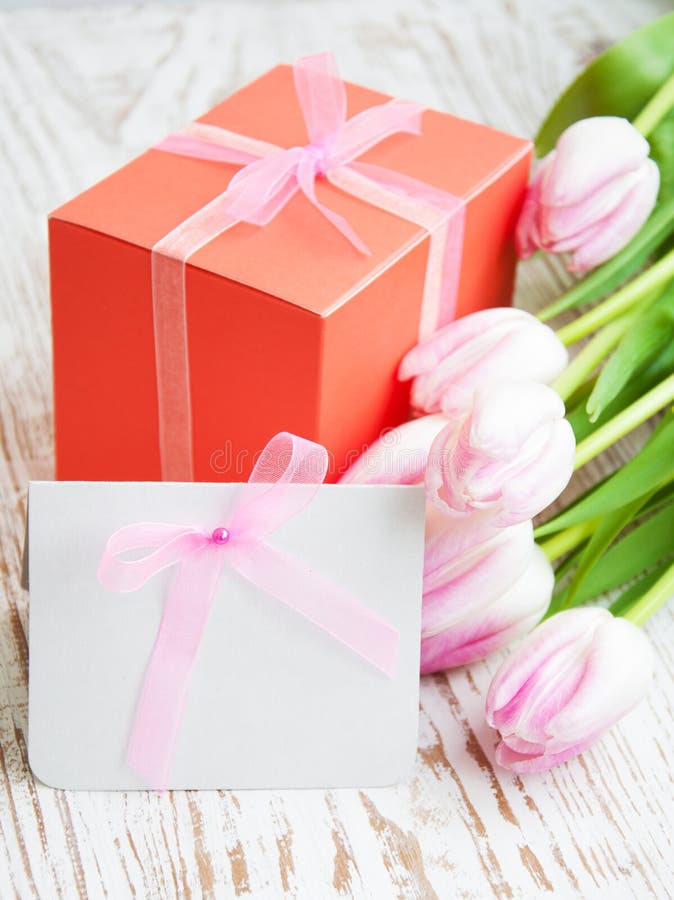 Bunch of Tulips with Present Cart and Gift Box Stock Image - Image of ...