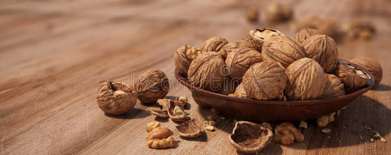 Bunch of Walnuts in a Wooden Plate on the Table Stock Image - Image of ...