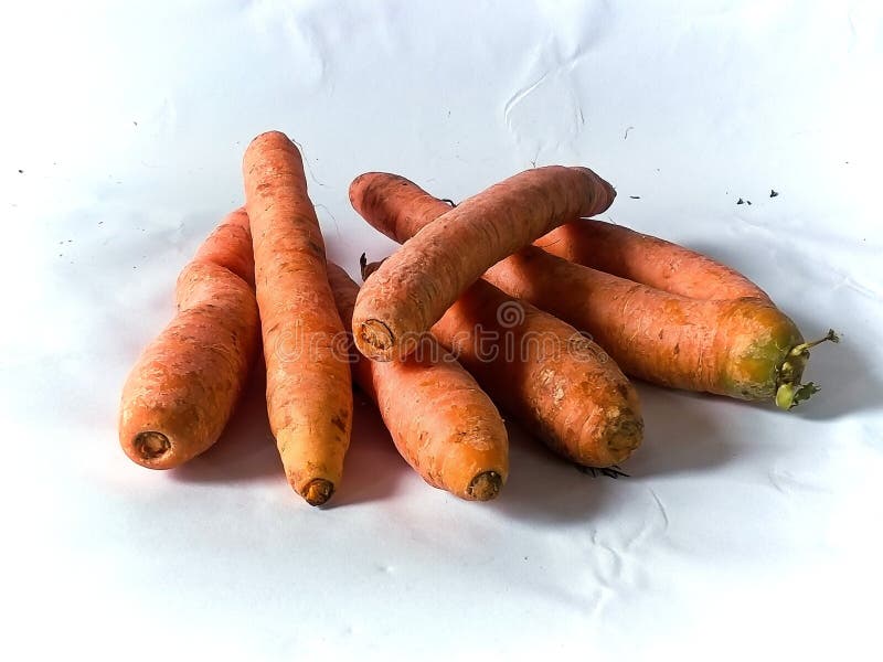 A Bunch of Washed, Peeled Orange Carrots on a White Background Stock ...