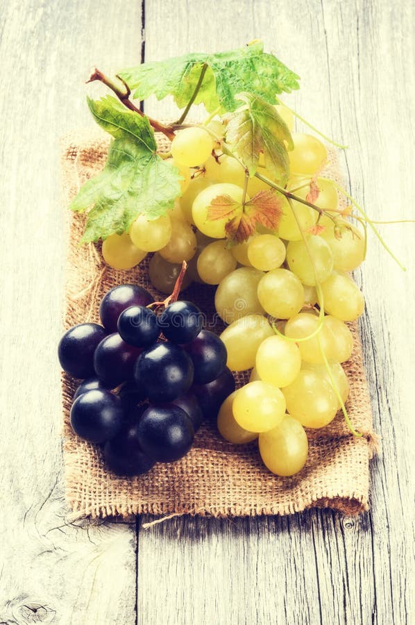 Bunch of White and Red Grapes in Rustic Setting Stock Photo - Image of ...
