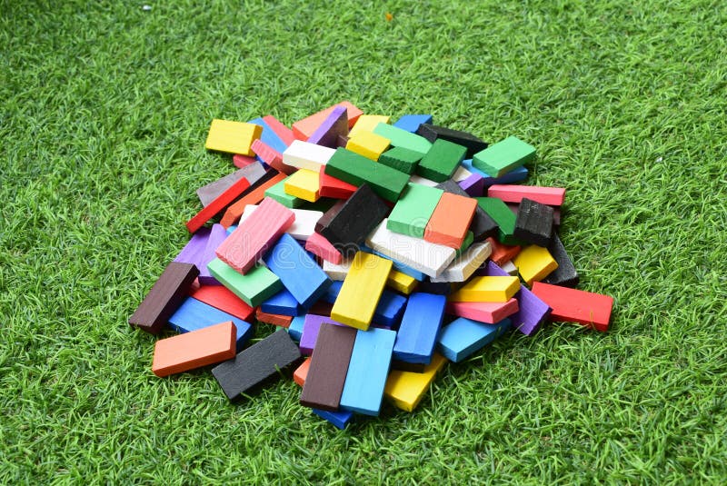 Bunch of Wooden Blocks on Green Grass Stock Photo - Image of colored ...