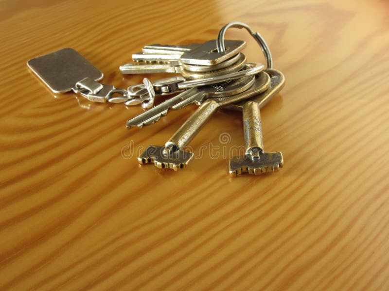 Bunch of Worn House Keys on Wooden Table Stock Photo - Image of house ...