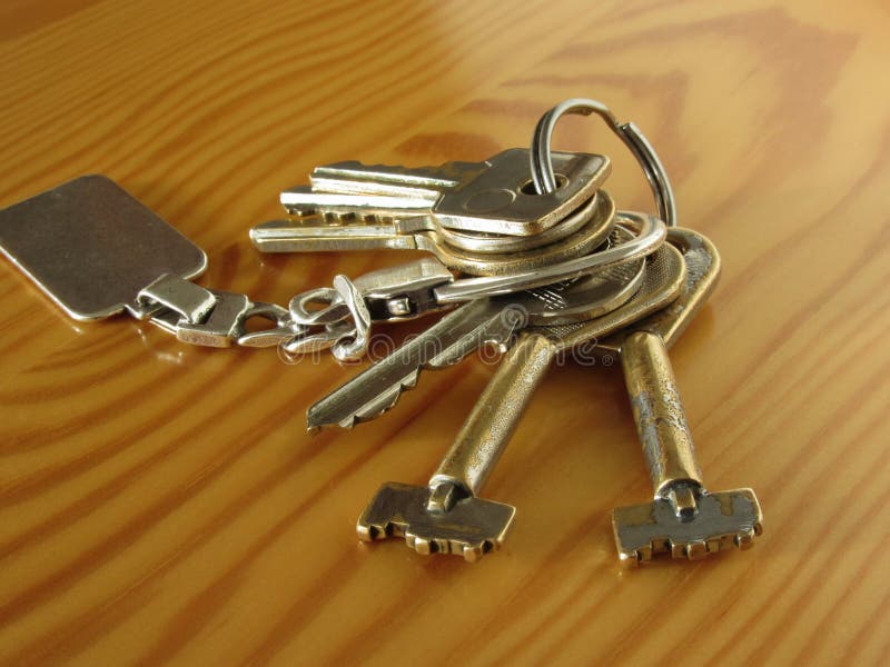 Bunch of Worn House Keys on Wooden Table Stock Image - Image of ...