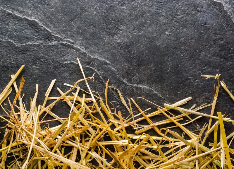 A Bunch of Yellow Straw on the Black Background of an Empty Slab of ...