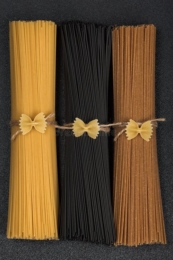 Bunches of Different Types of Italian Spaghetti. Black, Brown and ...