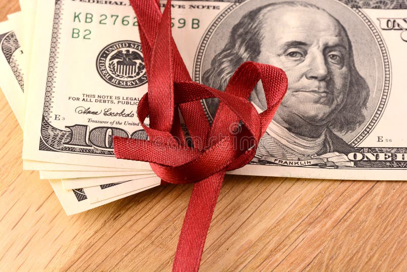 Bundle of Dollars Tied with Ribbon Stock Photo - Image of charity ...
