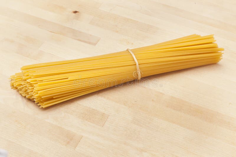 Bundle of dry spaghetti stock photo. Image of ingredient - 25163006
