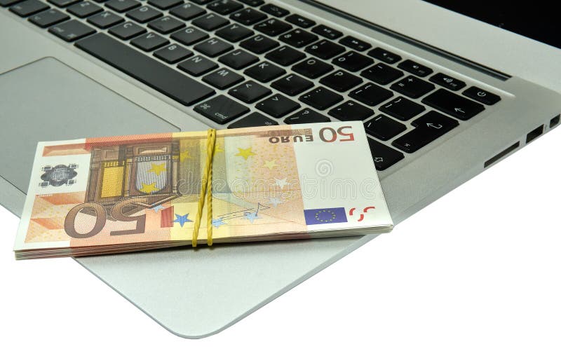 A Bundle of 50 Euro Bills Lying on a Computer Keyboard Stock Photo ...