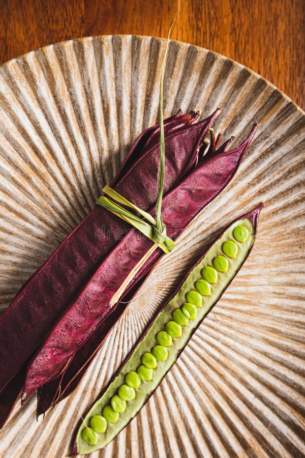 Bundle of Guaje Seed Pods on a Plate with an Open Seed Pod Stock Image ...